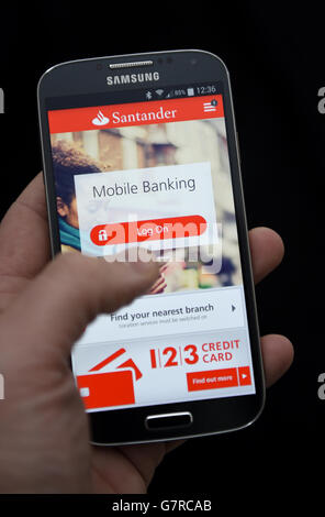 Santander mobile banking app on an iPhone mobile phone Stock Photo - Alamy