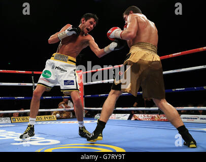 Gavin McDonnell (left) and Oleksandr Yegorov in action during the ...