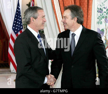 President George W. Bush shakes the hand of U.S. Army Sgt. First Class ...