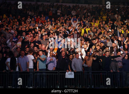 Boxing - First Direct Arena. Boxing fans cheer from the stands at the ...