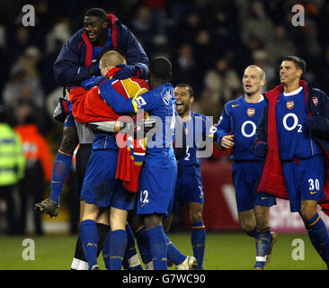 Arsenal players celebrate their win against Wigan Athletic after a ...