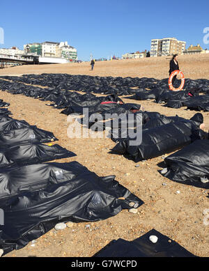 Two hundred black body bags lined up on Brighton beach in East Sussex ...
