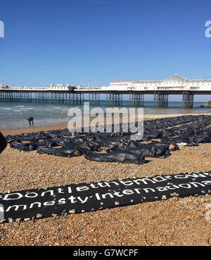 Amnesty holds body bag protest Stock Photo - Alamy