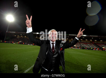 Bournemouth Chairman Jeff Mostyn celebrates on the pitch after the ...