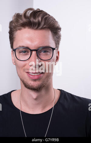 smart young professional smiling into the camera Stock Photo - Alamy