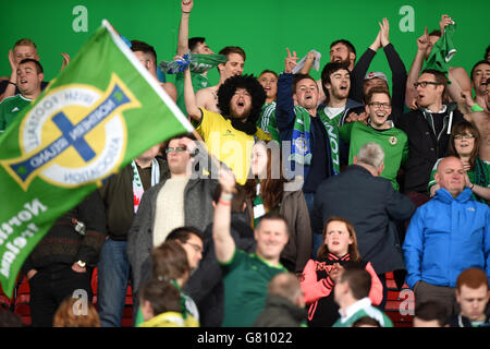 Fans of Qatar cheer in the stands during the World Cup Group B soccer ...