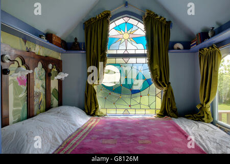 A summerhouse in the style of a Victorian tin tabernacle chapel in ...