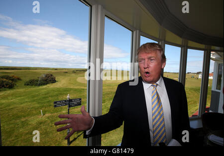 Donald Trump stands in the Duel in the Sun restaurant after unveiling ...
