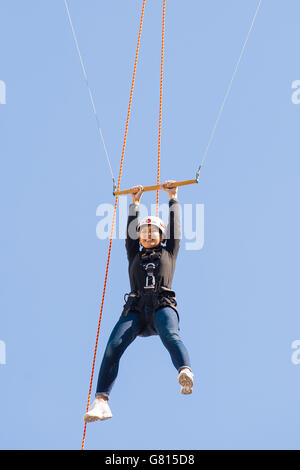 Prized Apart presenter Emma Willis is lowered to the ground after ...