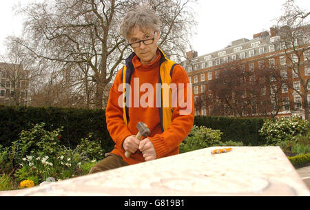 British artist and sculptor Simon Verity demonstrating his stone ...