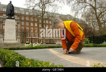 British artist and sculptor Simon Verity demonstrating his stone ...