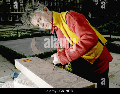British artist and sculptor Simon Verity demonstrating his stone ...