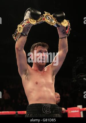 Craig Evans celebrates his victory over Tom Stalker during the WBO ...