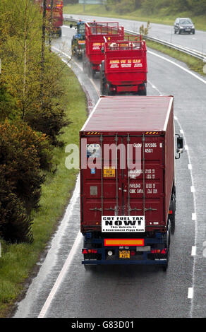 Tractors on a lorry near the protest organized by farmers in Rome ...
