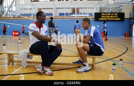 GB Volleyball player Dami Bakare (right) poses for a photograph with ...