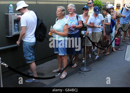 Spectators fill up water bottles on day three of the Lexus Eastbourne ...