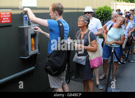 Spectators fill up water bottles on day three of the Lexus Eastbourne ...