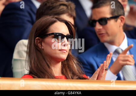 The Duchess of Cambridge watches the action on court one withThe AELTC ...