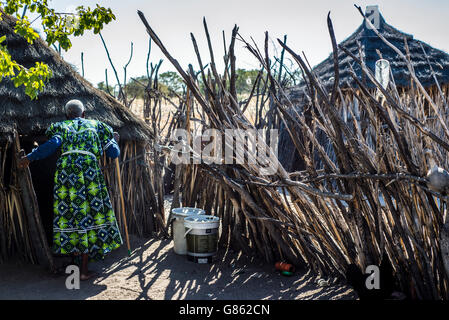 Ovambo woman near her kitchen in Oshipanda village, northern Namibia ...