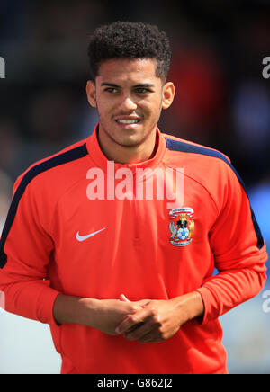 Coventry City's Devon Kelly-Evans battles with Carlisle United's Tom ...