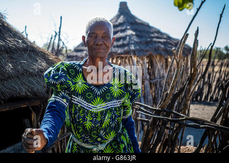 Ovambo woman near her kitchen in Oshipanda village, northern Namibia ...