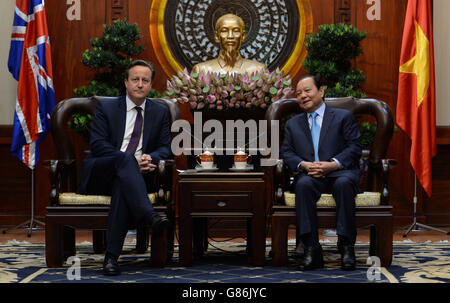 Vietnamese Prime Minister Le Minh Hung reacts during a meeting with ...