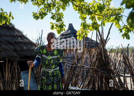 Ovambo woman near her kitchen in Oshipanda village, northern Namibia ...