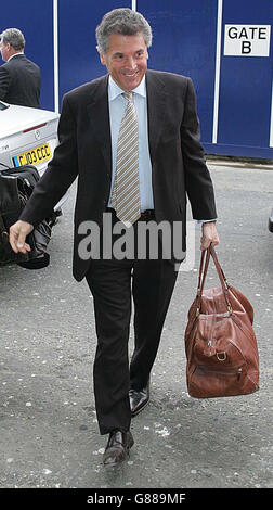 Arsenal Chairman David Dein arrives with his wife for the premiere of ...