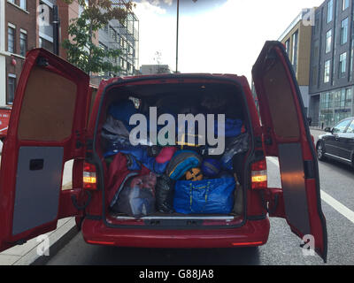 Some of the bags of clothes, blankets, tents and food in Dalston, east ...