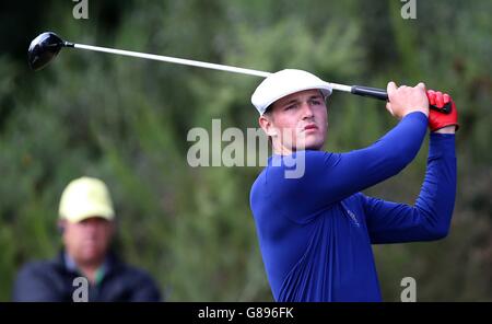 Bryson DeChambeau tees off on the 12th hole during the first round of ...