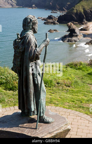The statue of Saint Caranog, on the Wales Coast Path at Llangrannog, on ...