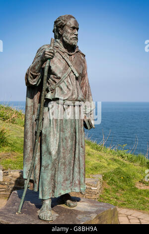 The statue of Saint Caranog, on the Wales Coast Path at Llangrannog, on ...