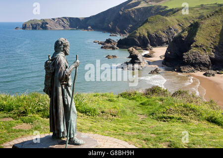 The statue of Saint Caranog, on the Wales Coast Path at Llangrannog, on ...