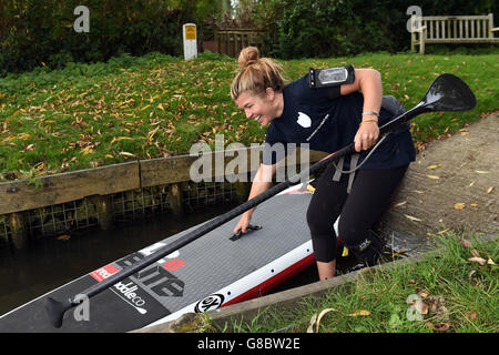 Amber Nuttall launches her paddle board into the River Thames at the ...