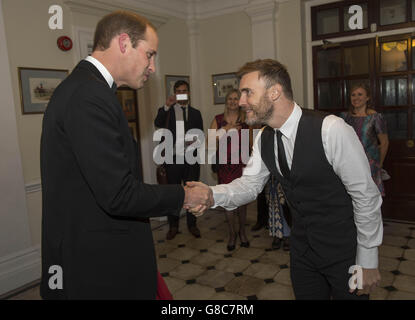 The Duke of Cambridge, Royal Patron of Child Bereavement UK, with Sir ...