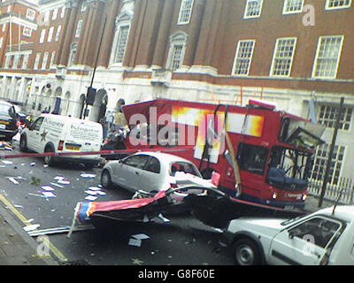 The scene of the Number 30 Bus bomb at Tavistock Square is combed by ...