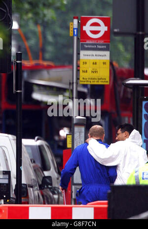 The scene of the Number 30 Bus bomb at Tavistock Square is combed by ...