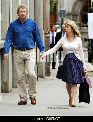 Sion Jenkins arrives, with his wife Christina, where he faces trial ...