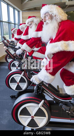 EDITORIAL USE ONLY Members of The Ministry of Fun's Santa School ...