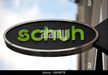 Shop sign stock. A shop sign for Schuh in central London Stock Photo ...