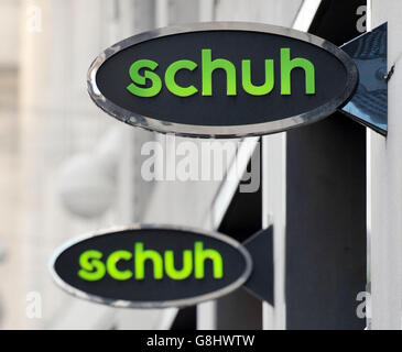 Shop sign stock. A shop sign for Schuh in central London Stock Photo ...