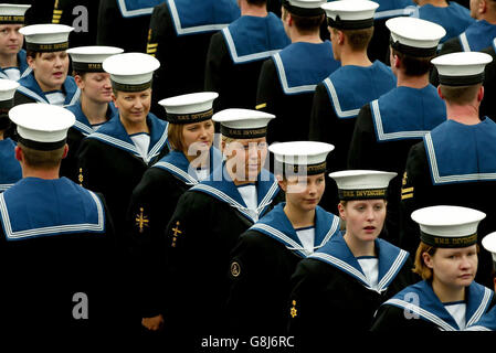 Crew line the decks of the Royal Navy frigate HMS LANCASTER as it ...