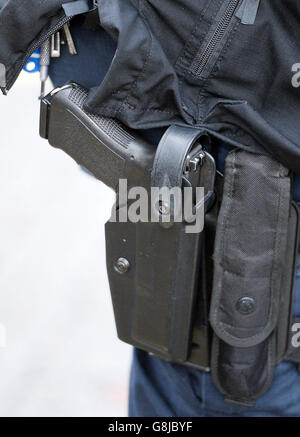 A pistol worn by a Metropolitan Police firearms officer in Westminster ...