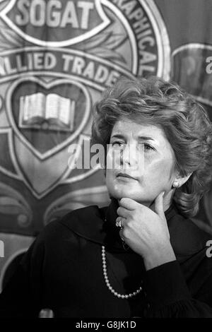 SOGAT '82 general secretary Brenda Dean (third from left) points to a ...