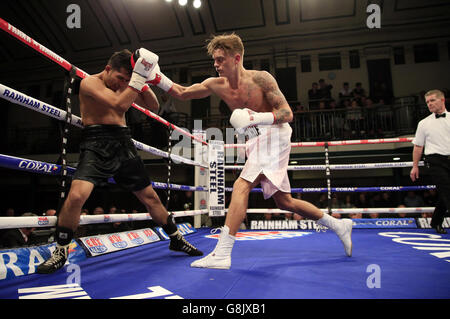 Archie Sharp (right) and Qasim Hussain during their lightweight contest ...