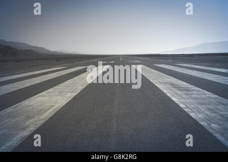Long paved runway shot from its threshold markings Stock Photo - Alamy
