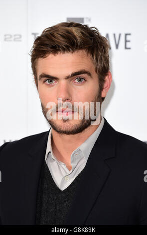Alex Roe attends a photo call for new sci-fi film The Fifth Wave at the ...