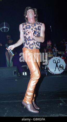 Scissor Sisters singer Jake Shears, foreground, performs during the ...