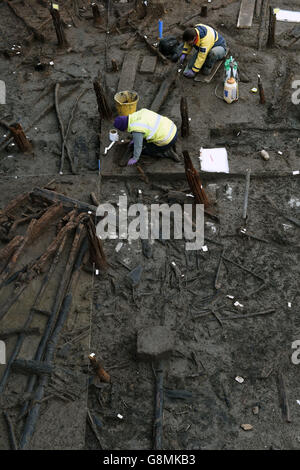 Archaeologists work on the Must Farm site near Peterborough in ...