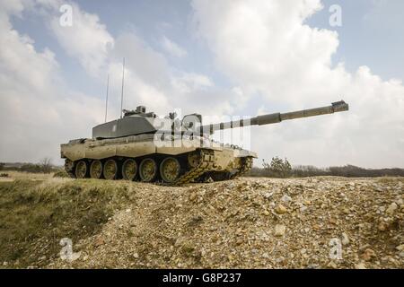 Challenger II tank firing live rounds during training, at the ranges ...